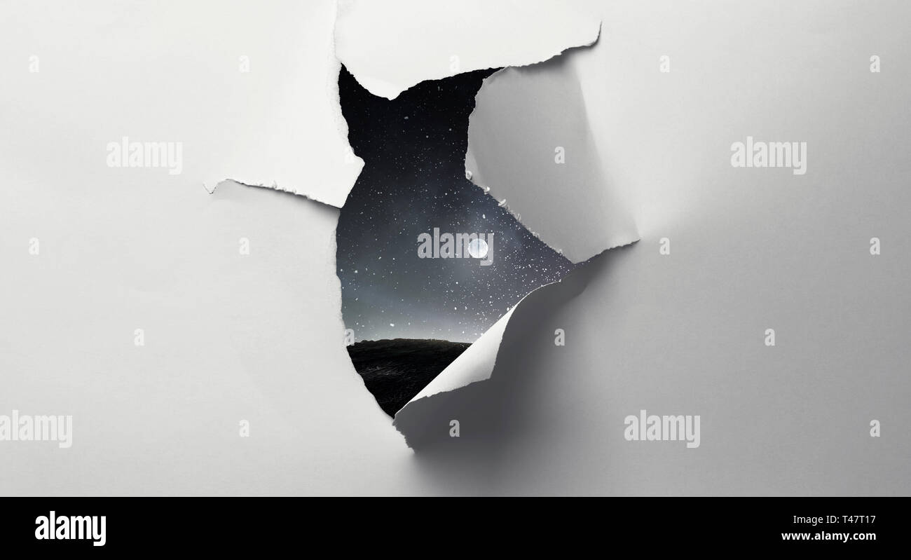 Effect of torn paper hole in the wall Stock Photo - Alamy