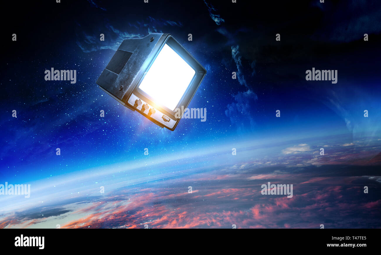 Retro TV flying in space Stock Photo - Alamy
