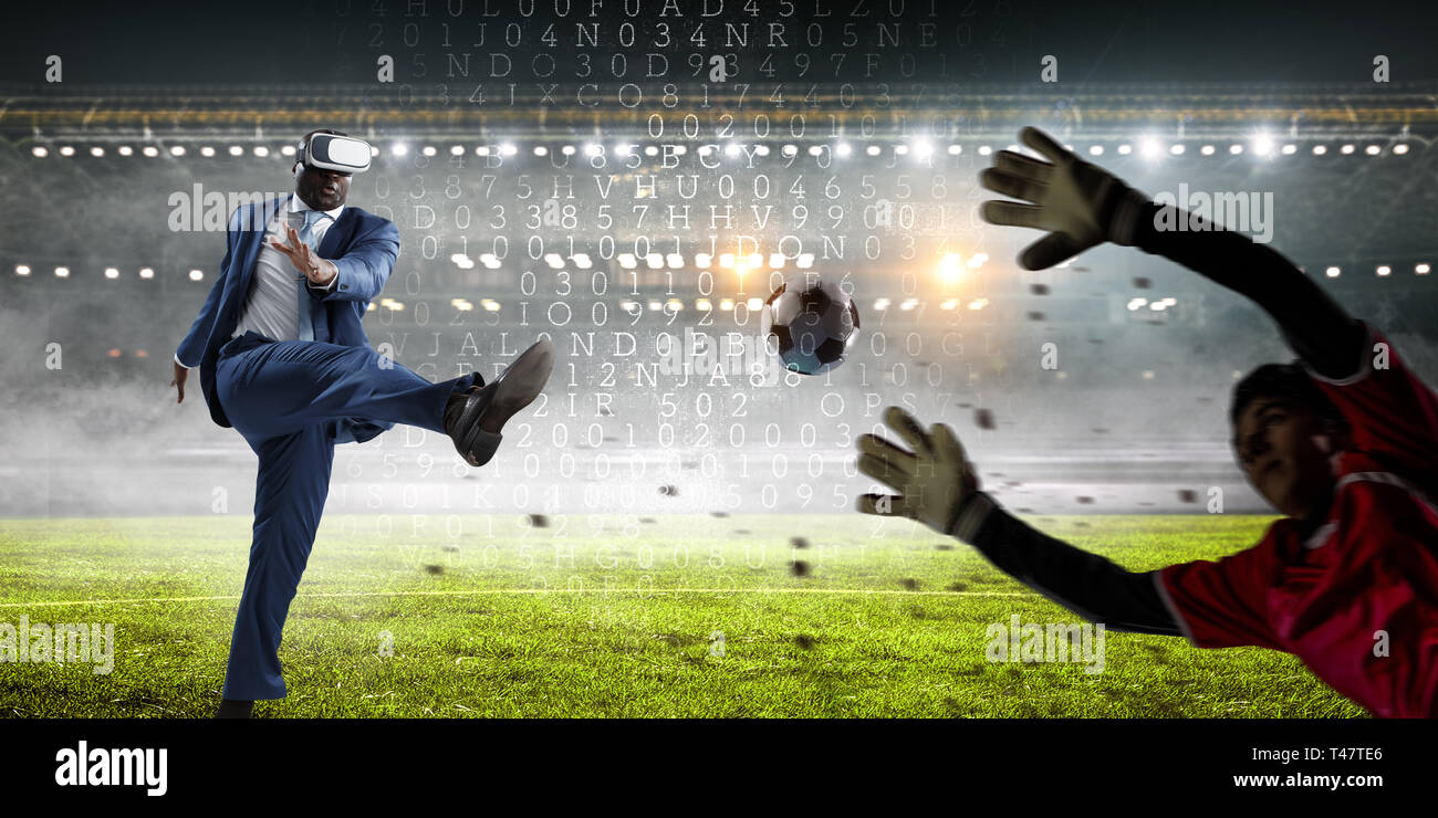 Virtual Reality Soccer Players on stadium Stock Photo - Alamy