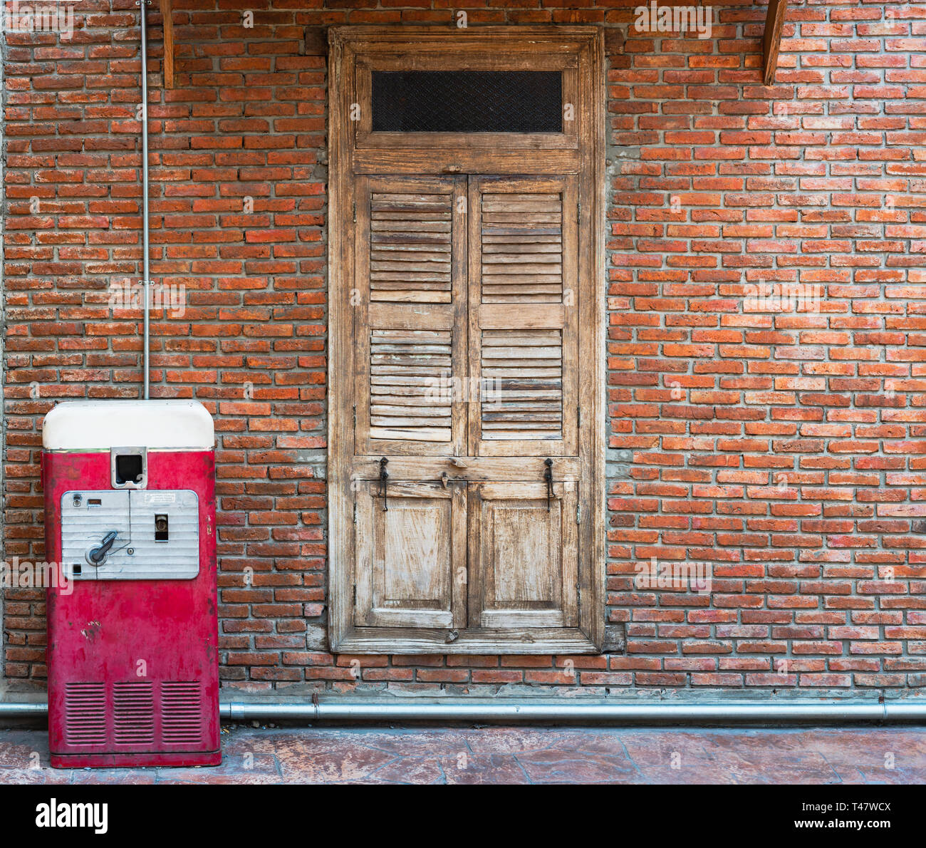 The old red classic vintage retro auto vending machine for soft drink ...