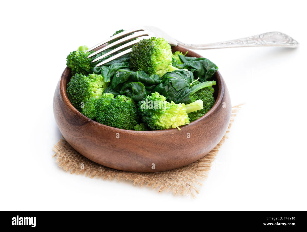 Steamed fresh broccoli with spinach isolated on white Stock Photo - Alamy