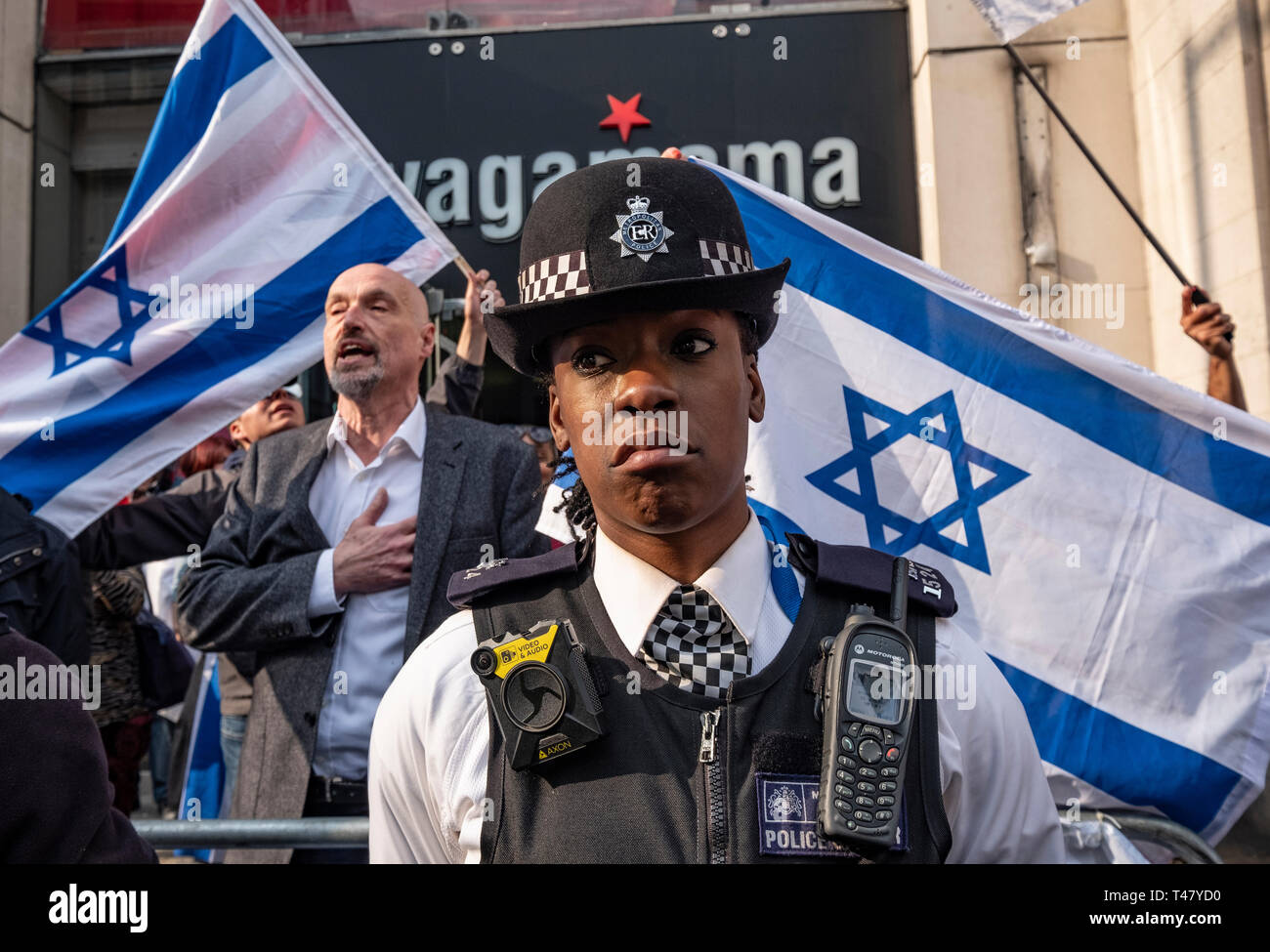 Israeli group being protected behind barrier outside the Israeli ...
