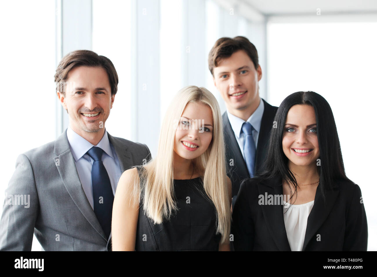 Happy business team coworkers hi-res stock photography and images - Alamy