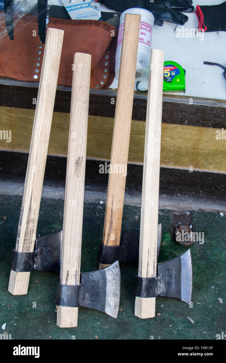 Steel axes with wooden handle in the view Stock Photo - Alamy