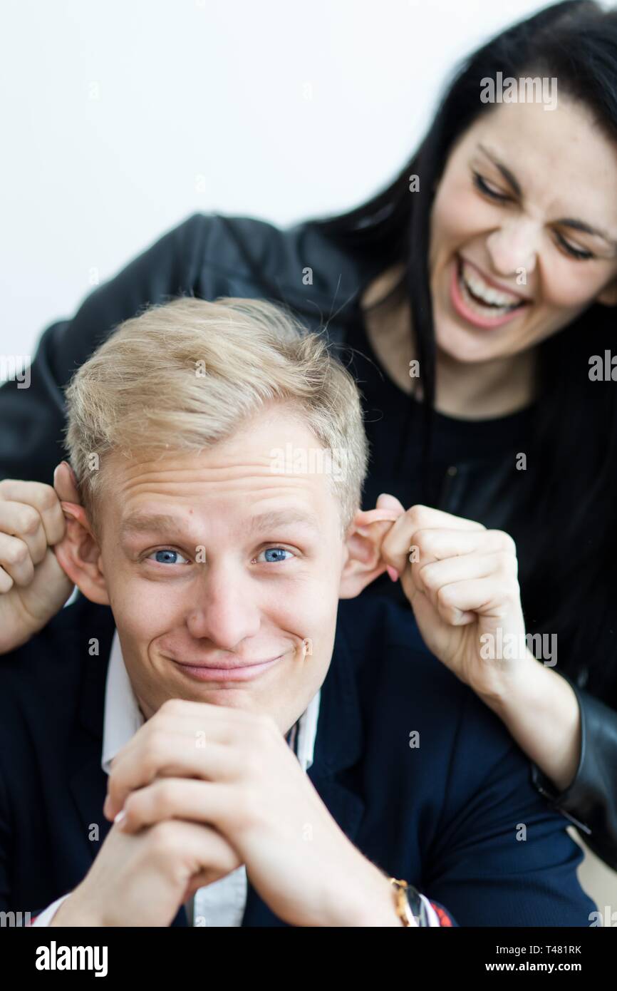 Ear pulling hi-res stock photography and images - Alamy