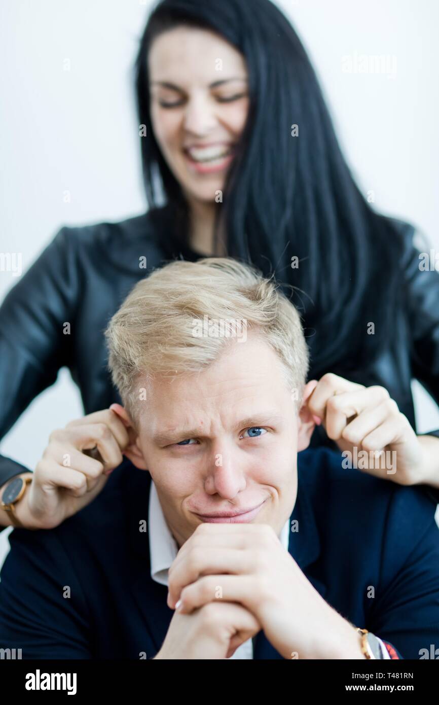 Ear pulling hi-res stock photography and images - Alamy