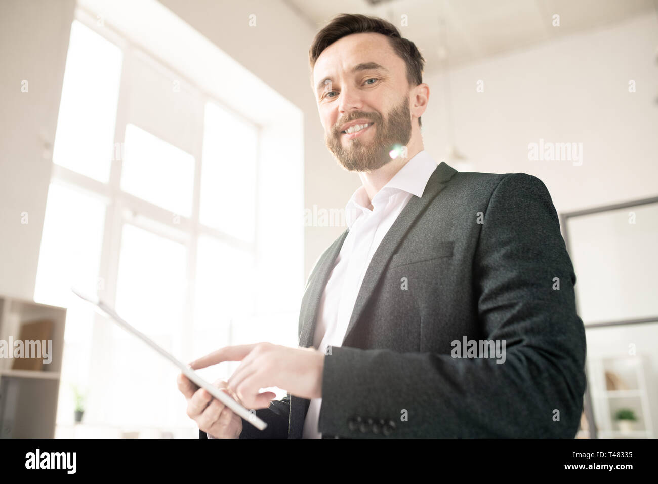 Man with touchpad Stock Photo - Alamy
