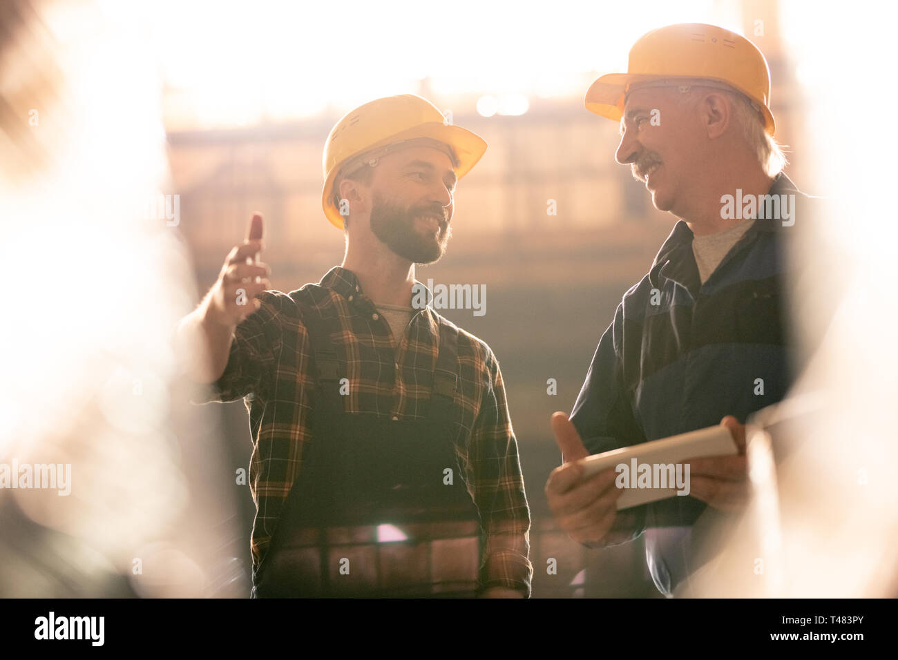 Working in industrial plant Stock Photo - Alamy