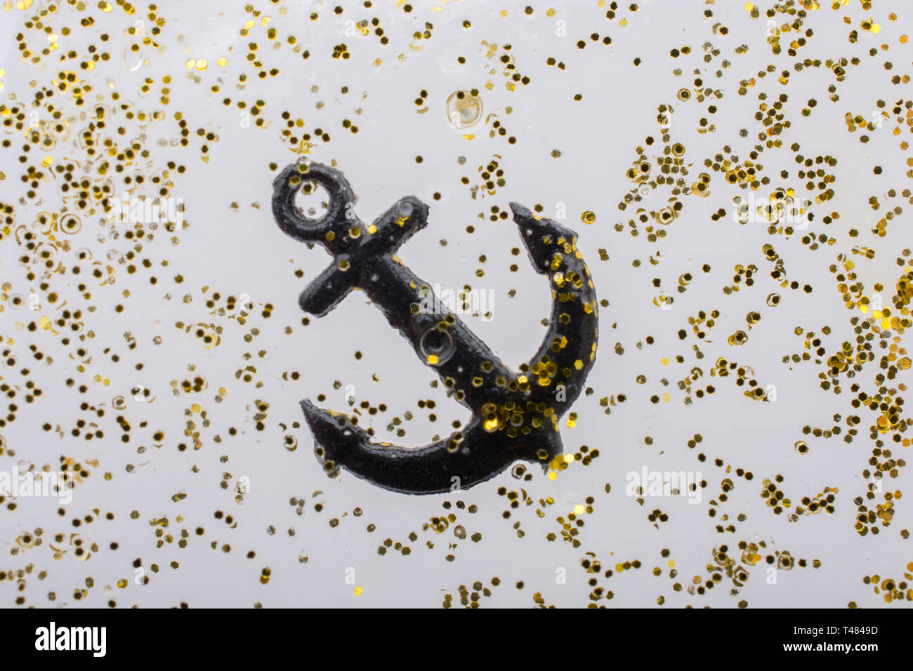 Tiny model anchor for decorative purposes Stock Photo - Alamy