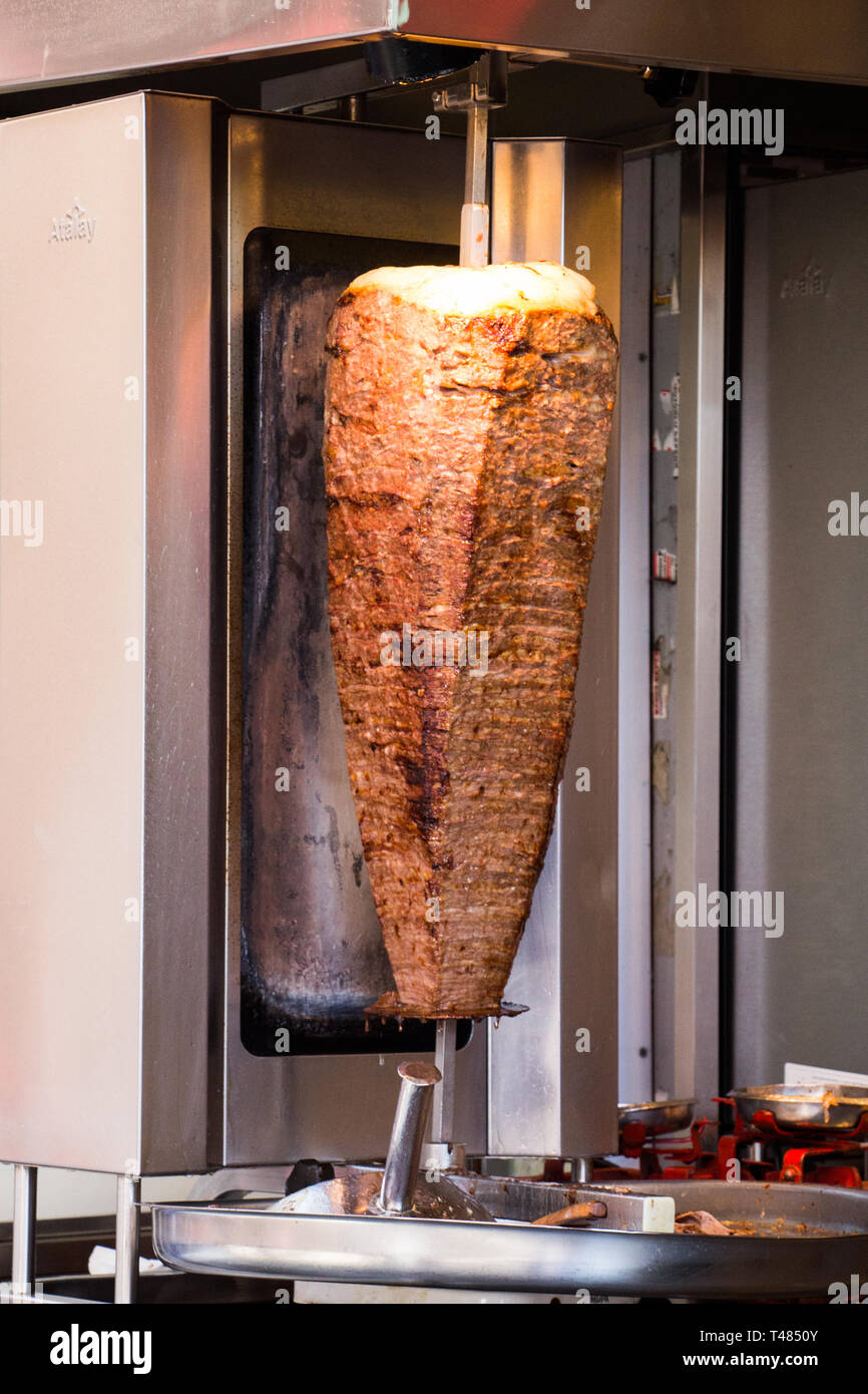 Traditional Turkish Doner Kebab on pole Stock Photo - Alamy