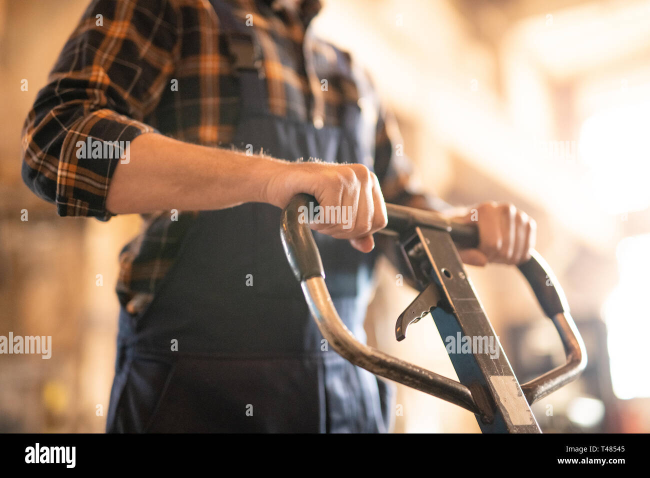 Using working tool Stock Photo - Alamy