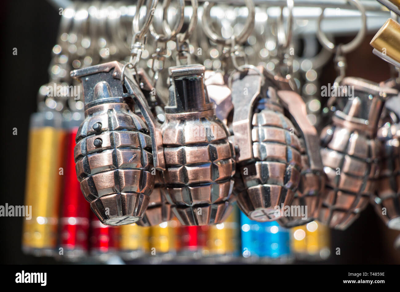 Miniature grenade shaped keychain in the view Stock Photo - Alamy