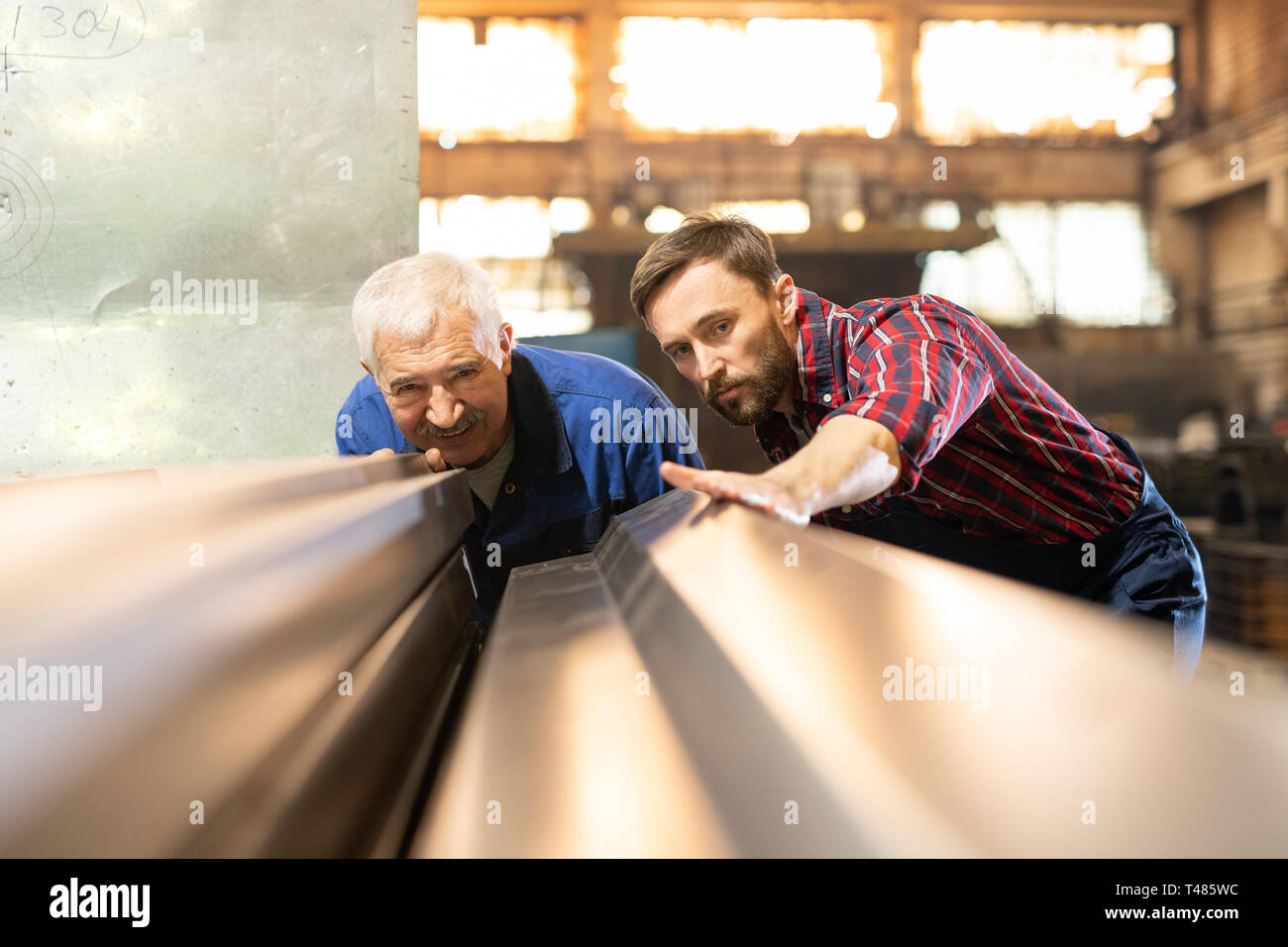 Engineer checking workpiece hi-res stock photography and images - Alamy