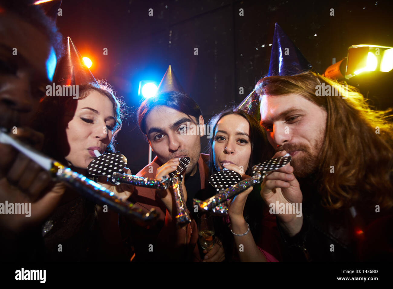 Friends making surprise party Stock Photo - Alamy