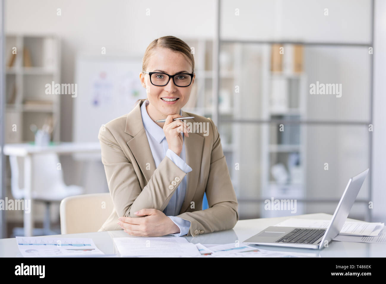 Successful business researcher in office Stock Photo - Alamy
