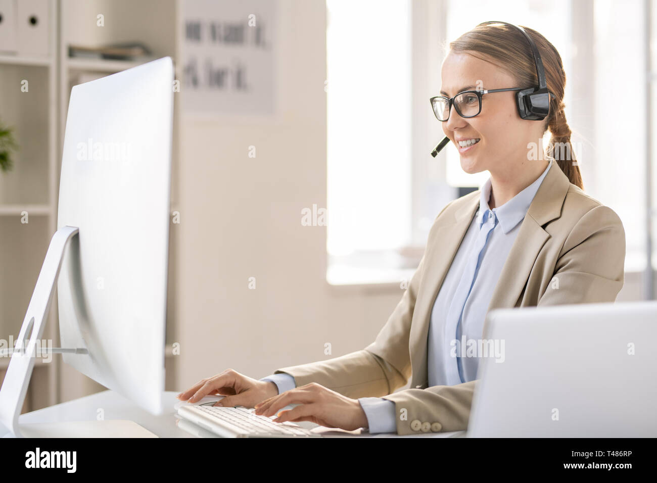 Call center operator at work Stock Photo - Alamy