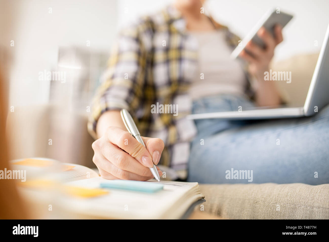 Planning timetable using organizer Stock Photo - Alamy