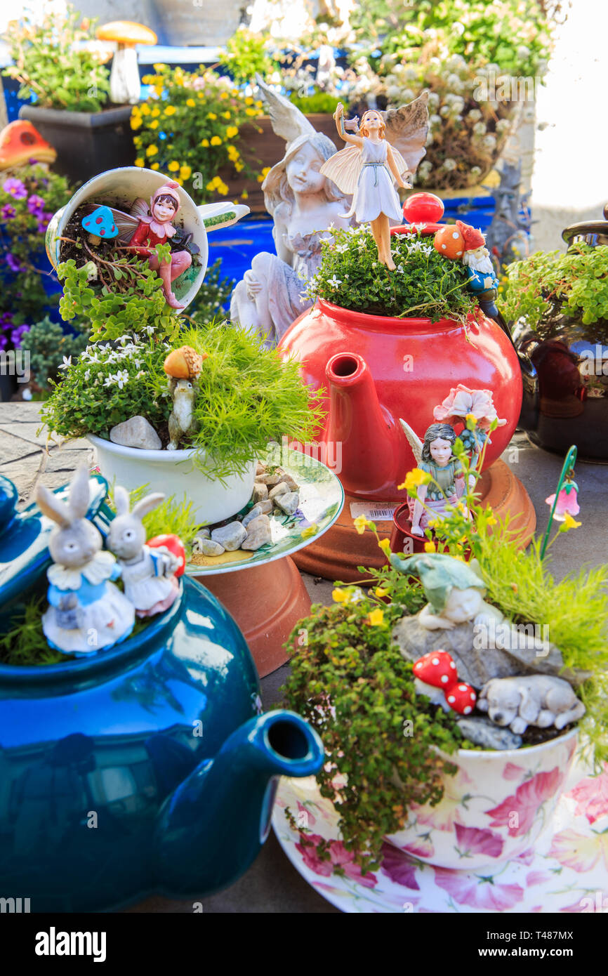 Miniature table top fairy garden with teapots and teacups used as ...