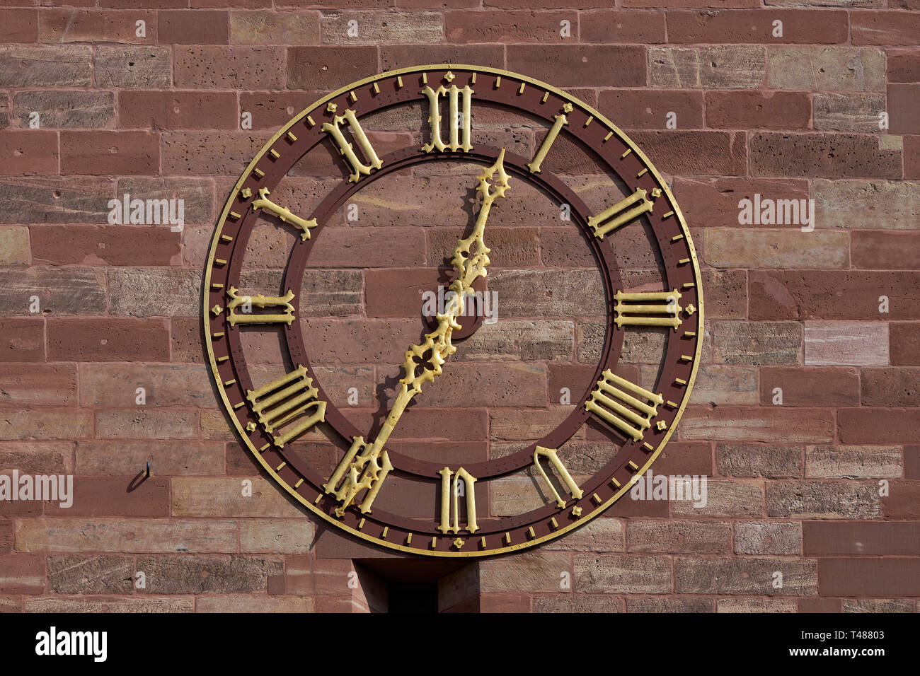 Church tower clock of the Basel cathedral with roman numerals Stock ...