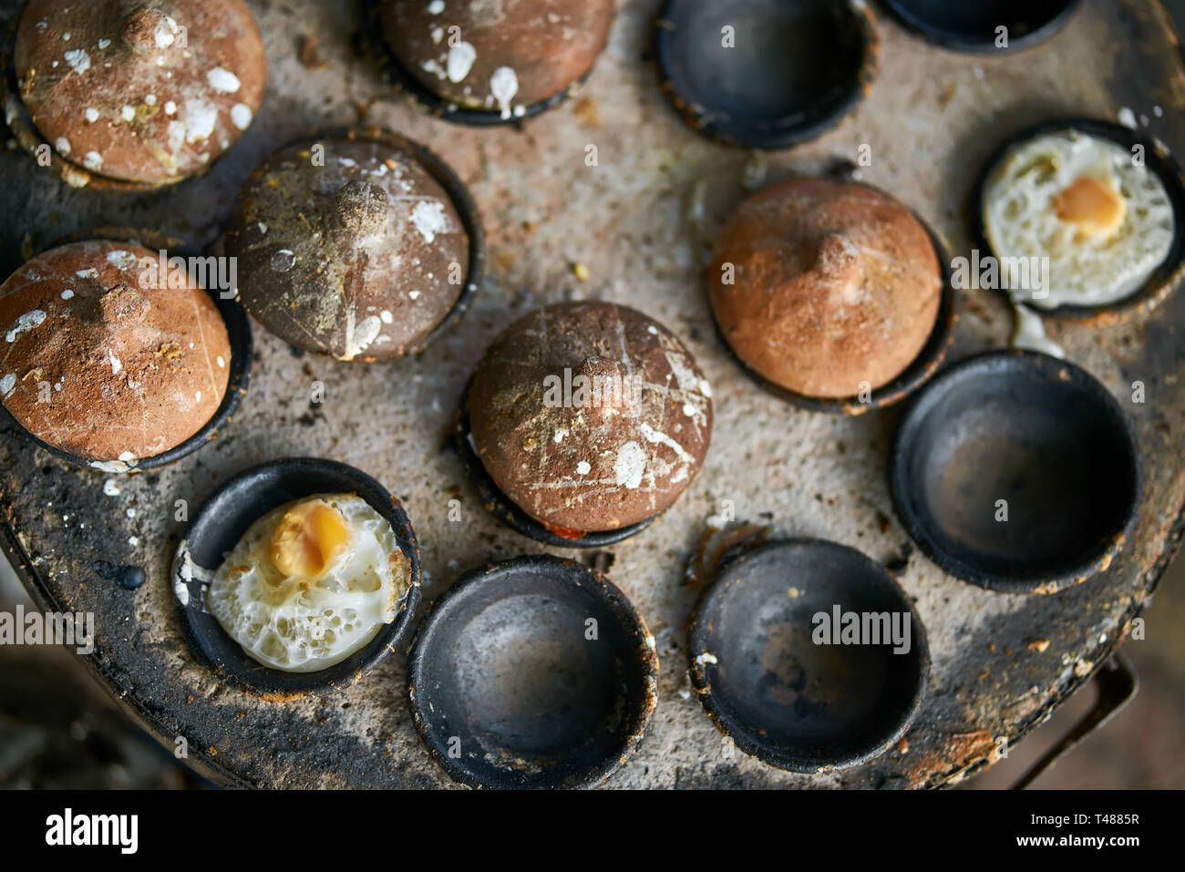 Street stone barbecue with grilled eggs in Vietnam Stock Photo - Alamy