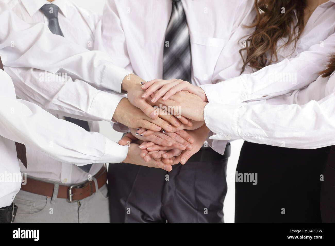 closeup .successful business team showing their unity.the concept of ...