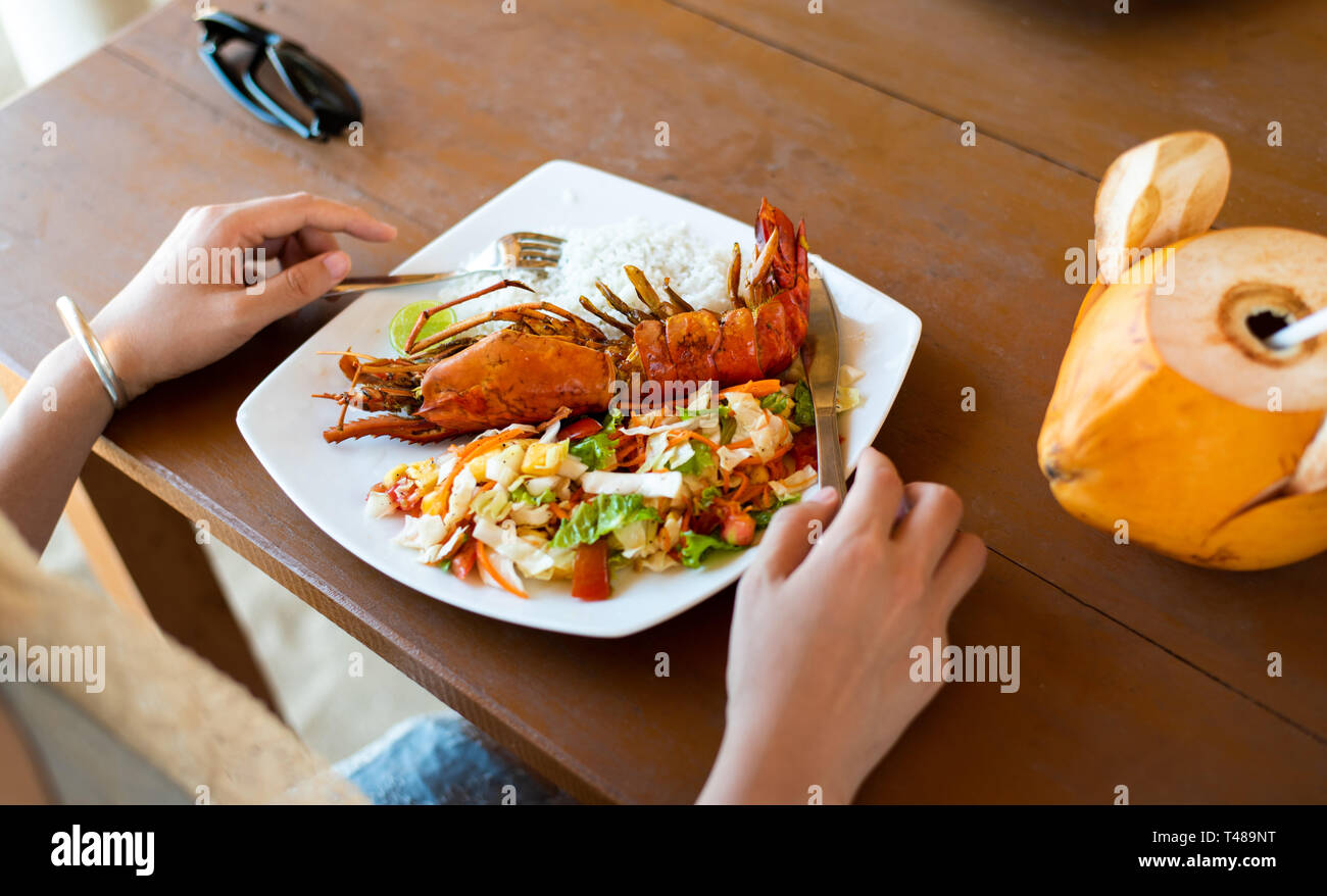 Girl having jungle prawns in a restaurant first person view Stock Photo ...