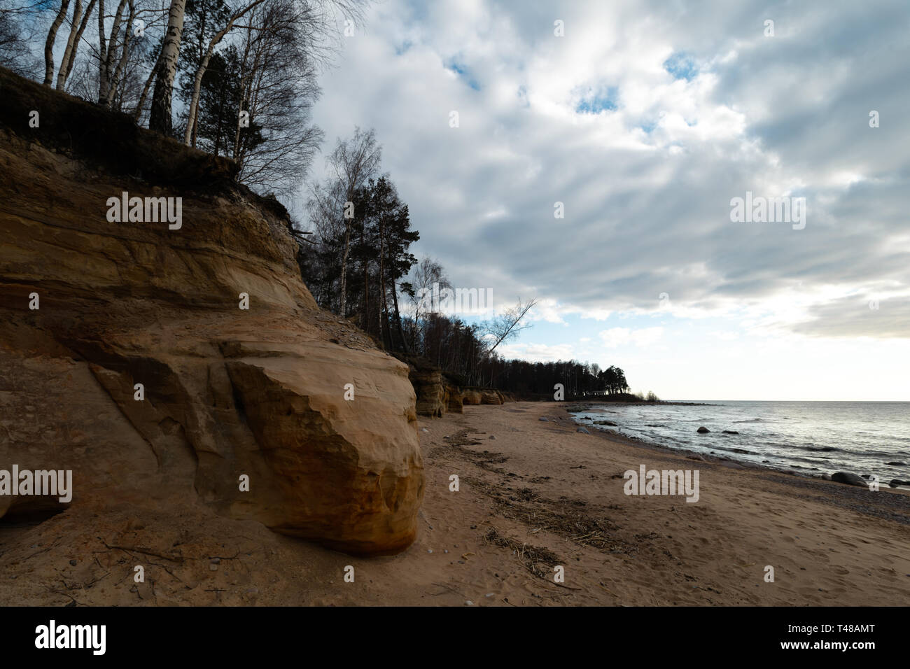 Limestone beach at the Baltic Sea with beautiful sand pattern and vivid ...