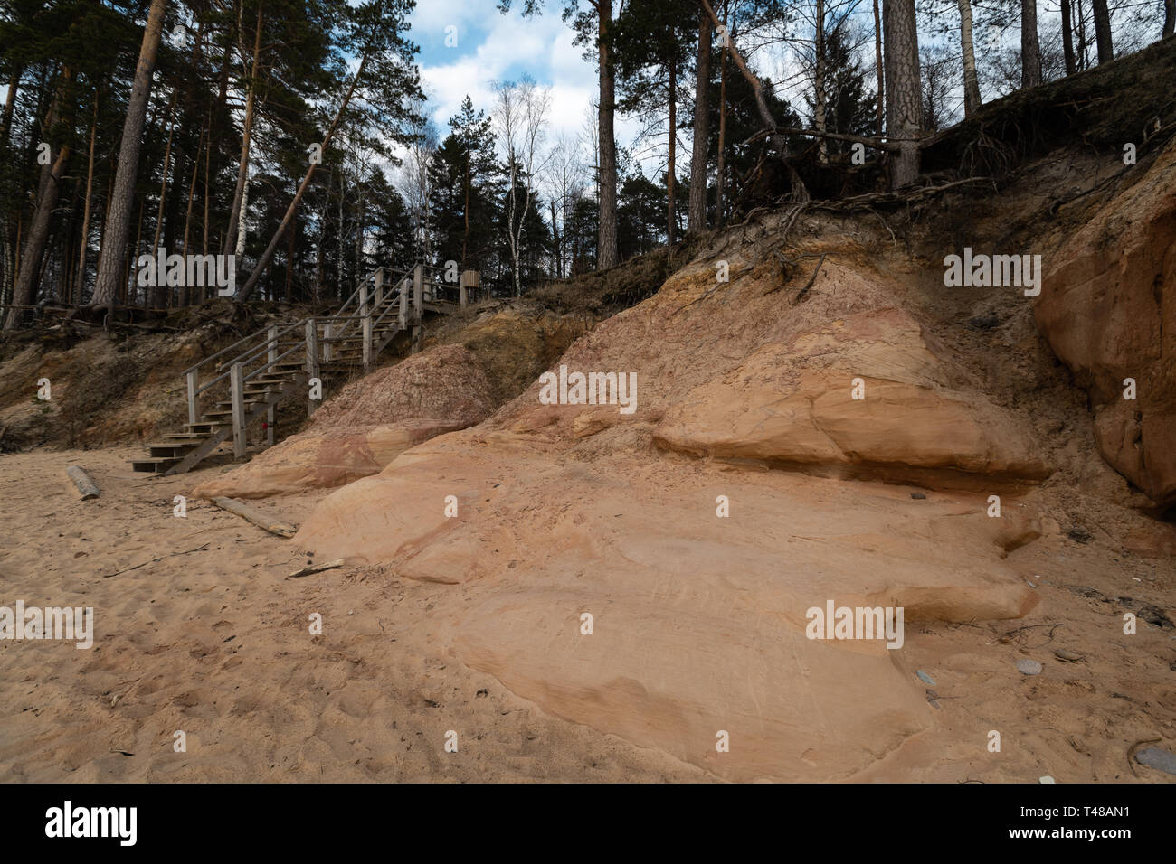 Limestone beach at the Baltic Sea with beautiful sand pattern and vivid ...