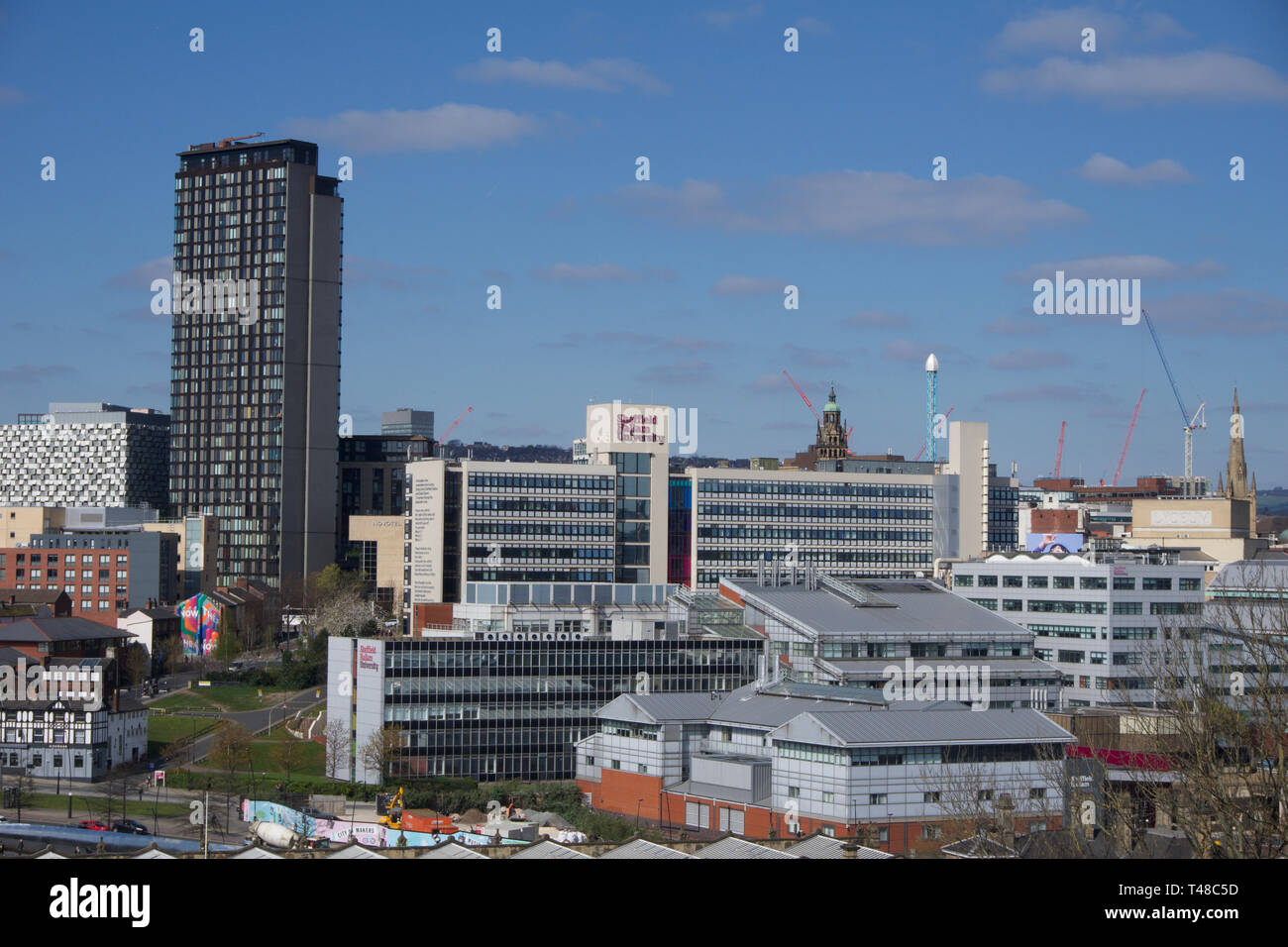 View of Sheffield City Centre across valley from Park Hill on a bright ...