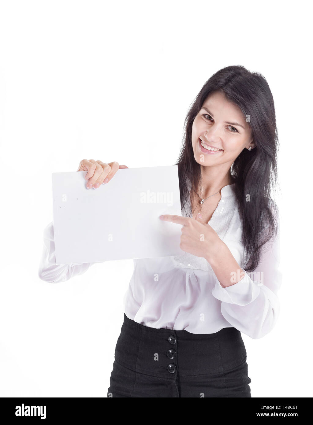 young business woman pointing to a blank piece of paper . isolated on ...