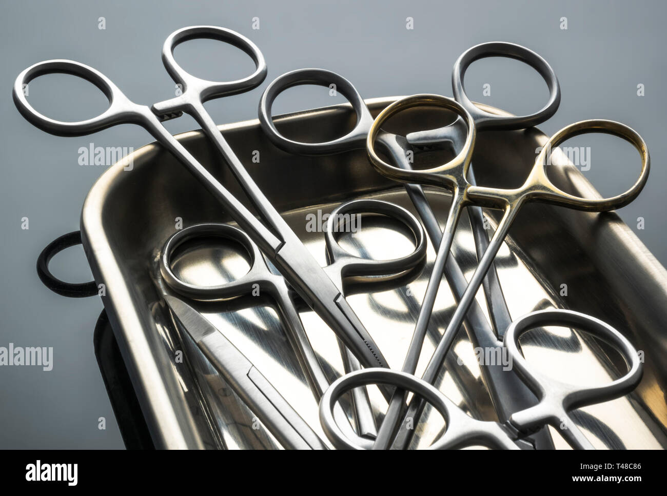 Some scissors for surgery on a tray in an operating theater, conceptual ...