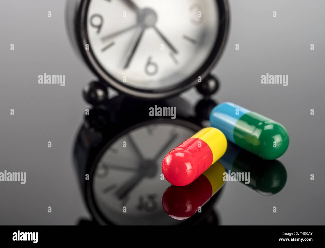Pill clock hi-res stock photography and images - Alamy