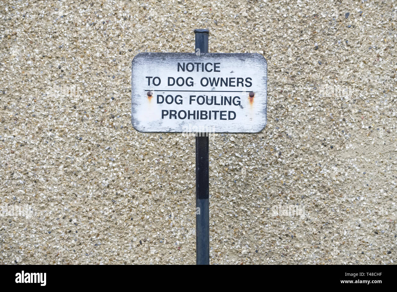 Dog fouling notice sign prohibited Stock Photo - Alamy