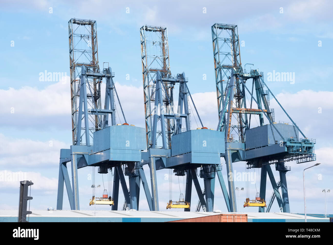 Container terminal crane gantry for loading and offloading cargo freight shipping at quay yard ...