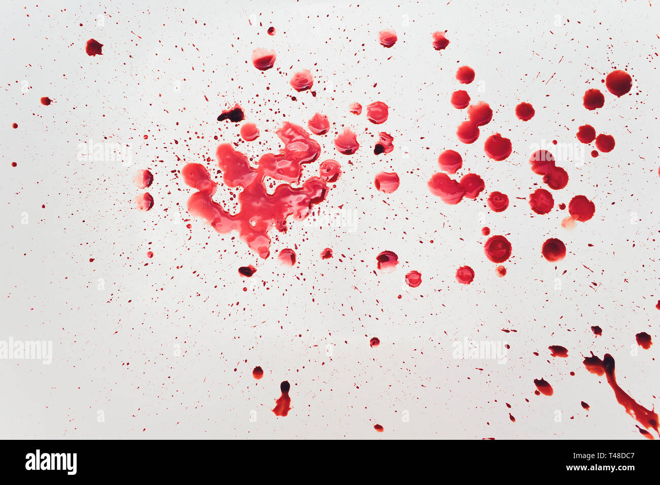 Fresh human bright red blood on floor Stock Photo - Alamy