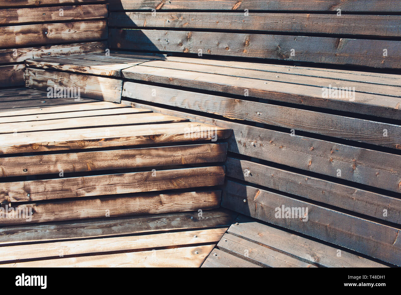 Wooden beach chairs by the waterfront. installation Stock Photo - Alamy