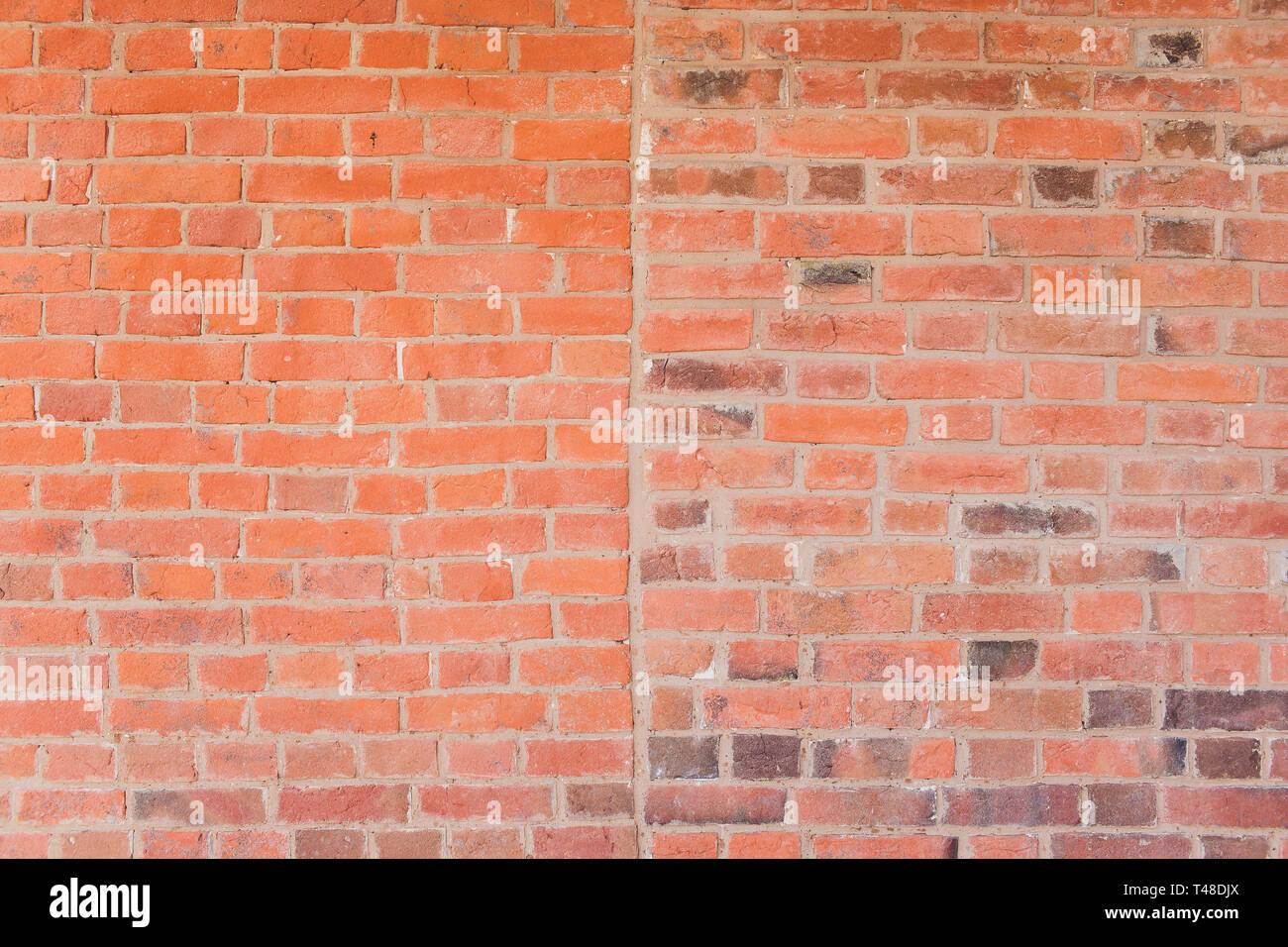 Rustic red brick wall used for house construction Stock Photo - Alamy