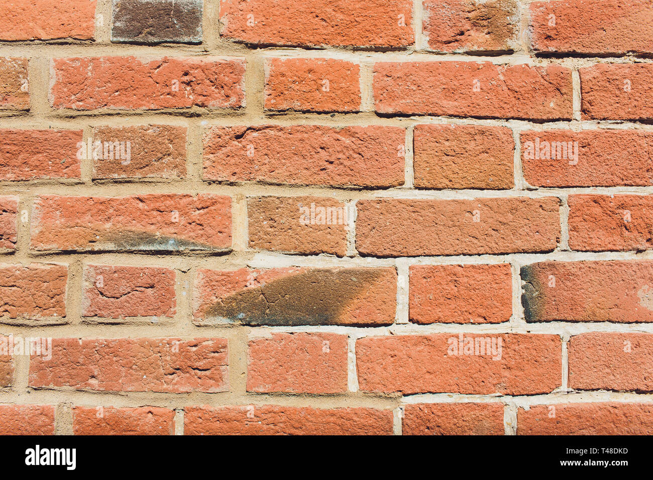 Rustic red brick wall used for house construction Stock Photo - Alamy