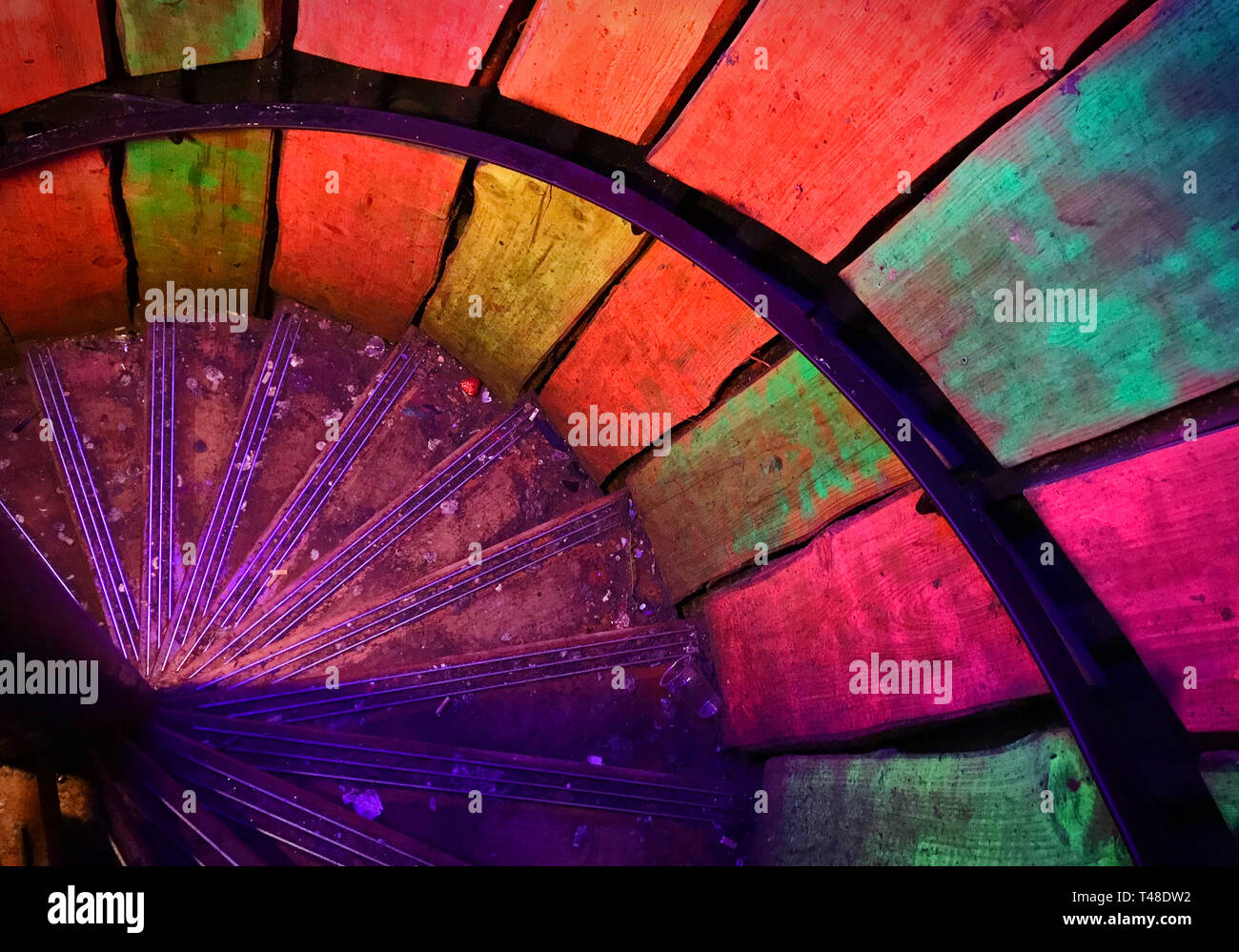 Multi-colored metal spiral staircase in old lighthouse Stock Photo - Alamy
