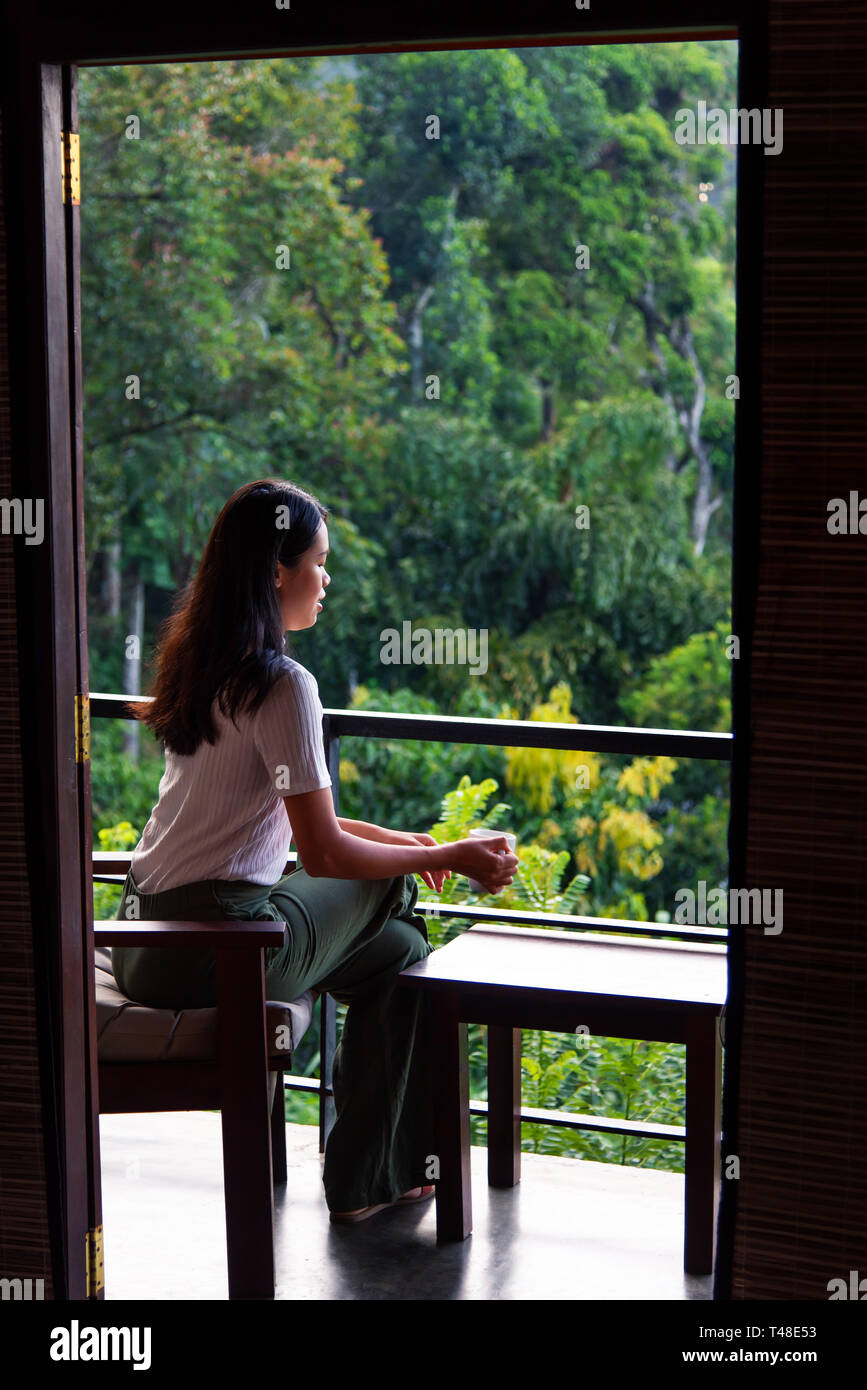 Girl woman balcony alone hi-res stock photography and images - Alamy