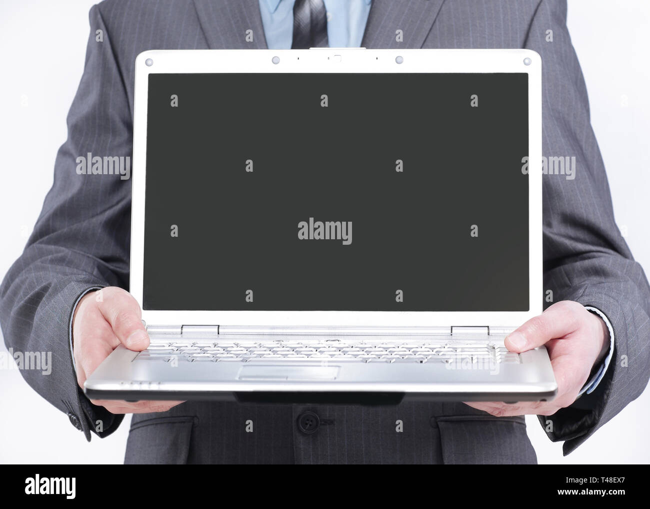 Manager showing open laptop .isolated on white background Stock Photo ...