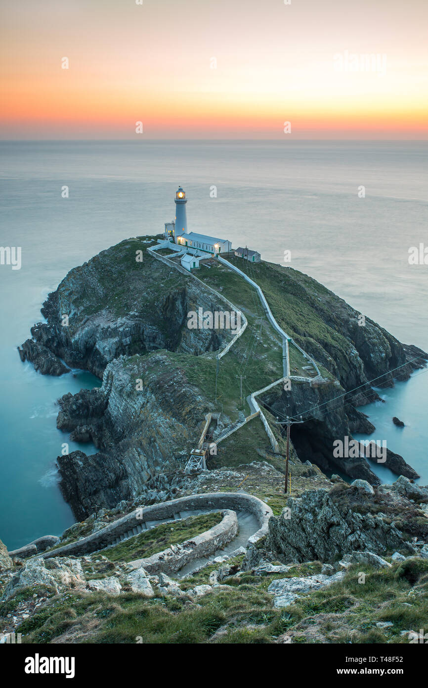 Early evening sunset scene looking out to sea towards South Stack ...