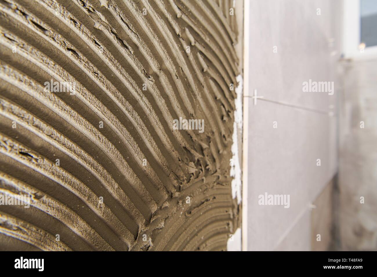 Ceramic Tiles Installations Using Tile Mortar. Closeup Photo Stock ...