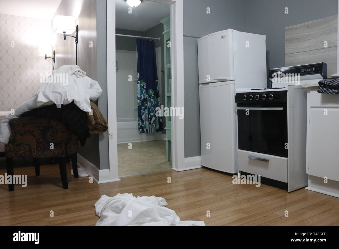 grey kitchen room prepared for client in apartment Stock Photo - Alamy