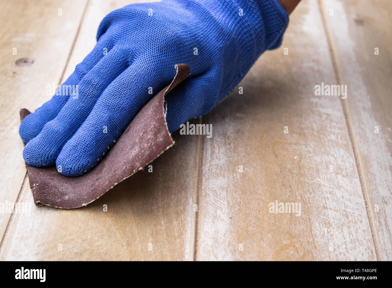 man prepares the surface for painting and grinding hands. Grinding ...