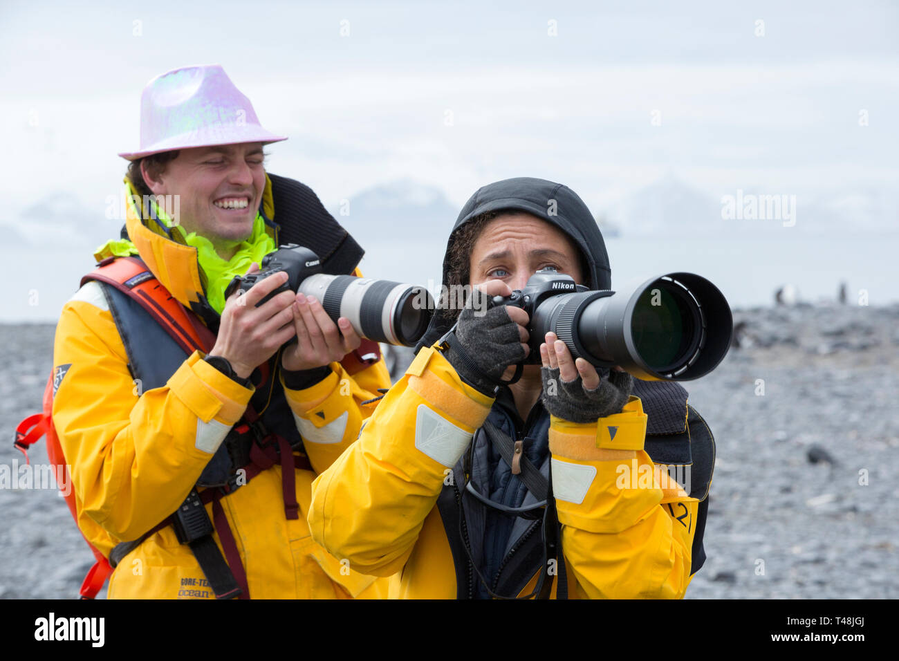 Polar tour guides at Elephant Point, Livingston Island, South Shetland ...