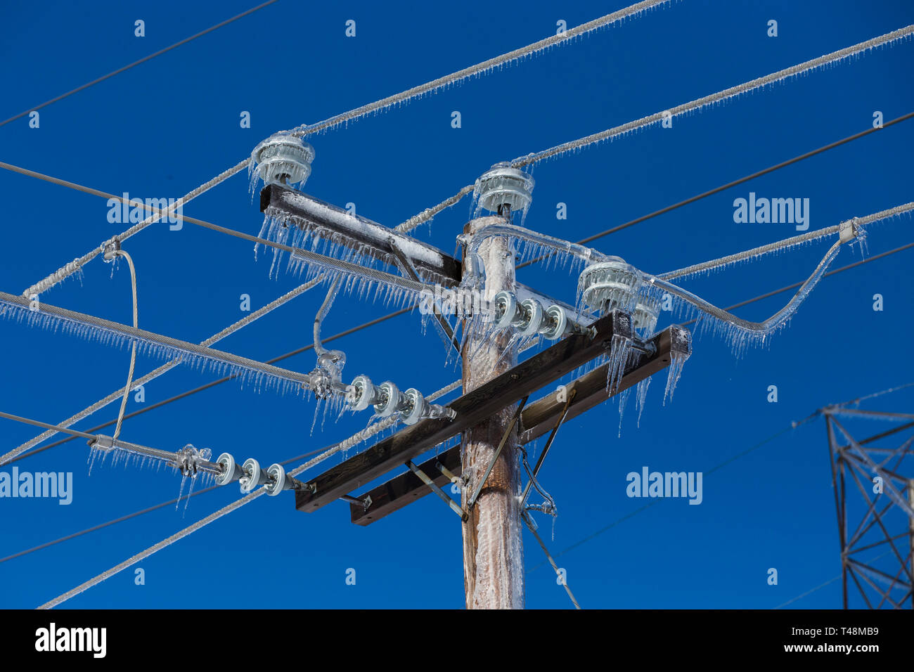 freezing rain on electric pole and wire, Montreal, 9 April, 2019 Stock ...