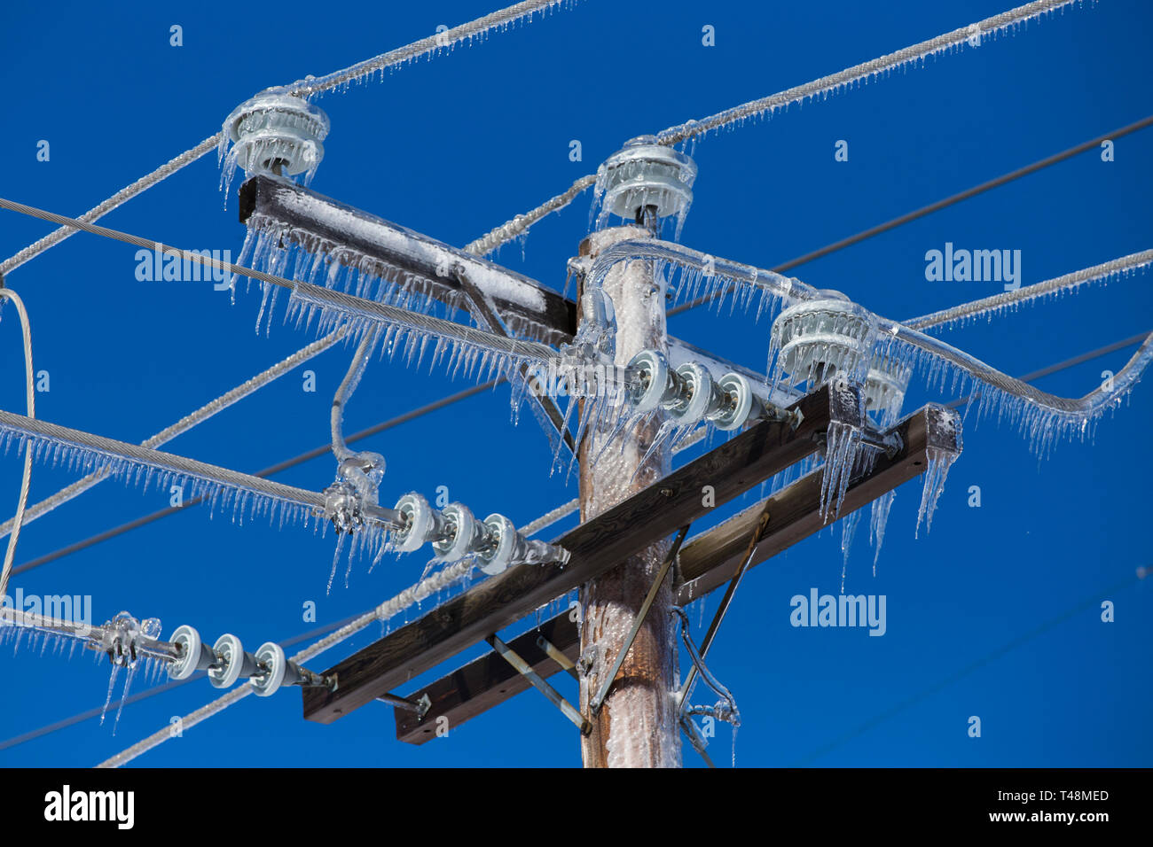 freezing rain on electric pole and wire, Montreal, 9 April, 2019 Stock ...