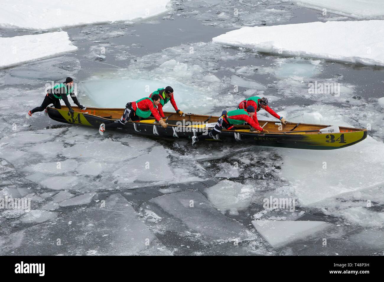 Canoe race challenge over the partly frozen Saint Lawrence River ...