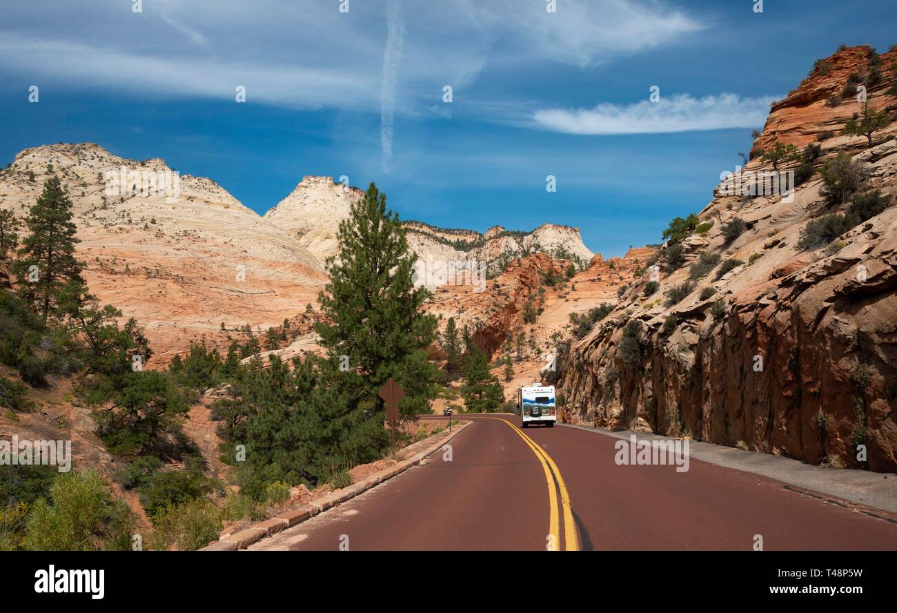 Caravan on road through mountain landscape, Zion-Mount Carmel Highway ...